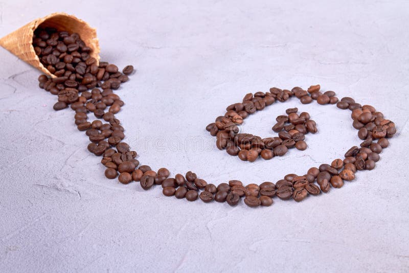 Ice Cream Cone with Coffee Beans in a Swirl Shape. Stock Image - Image ...