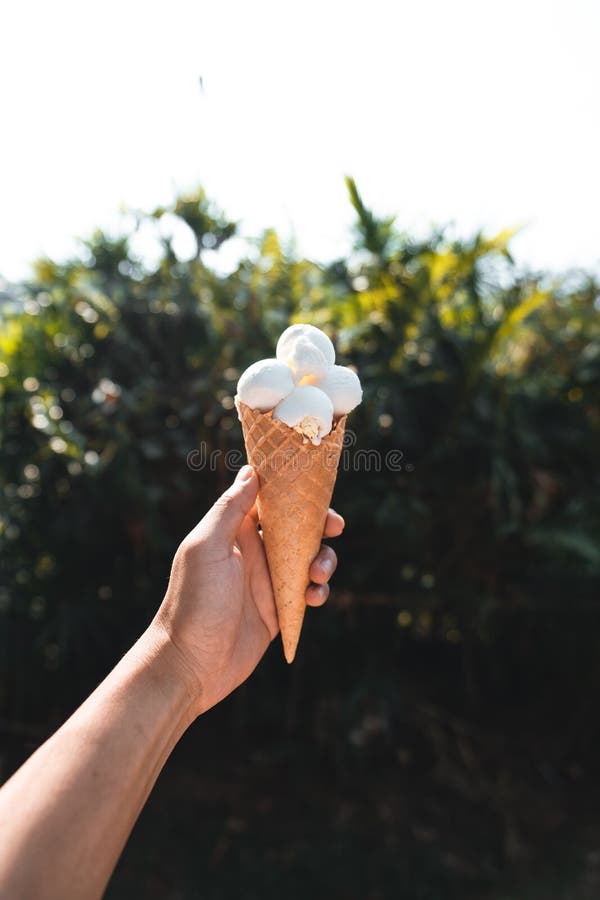 Ice Cream Cone,Ice Cream in Hand during the Hot Day Stock Photo - Image ...