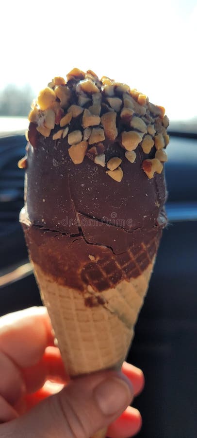 Ice Cream Cone with Nuts on Top Stock Photo - Image of chocolate, cone ...