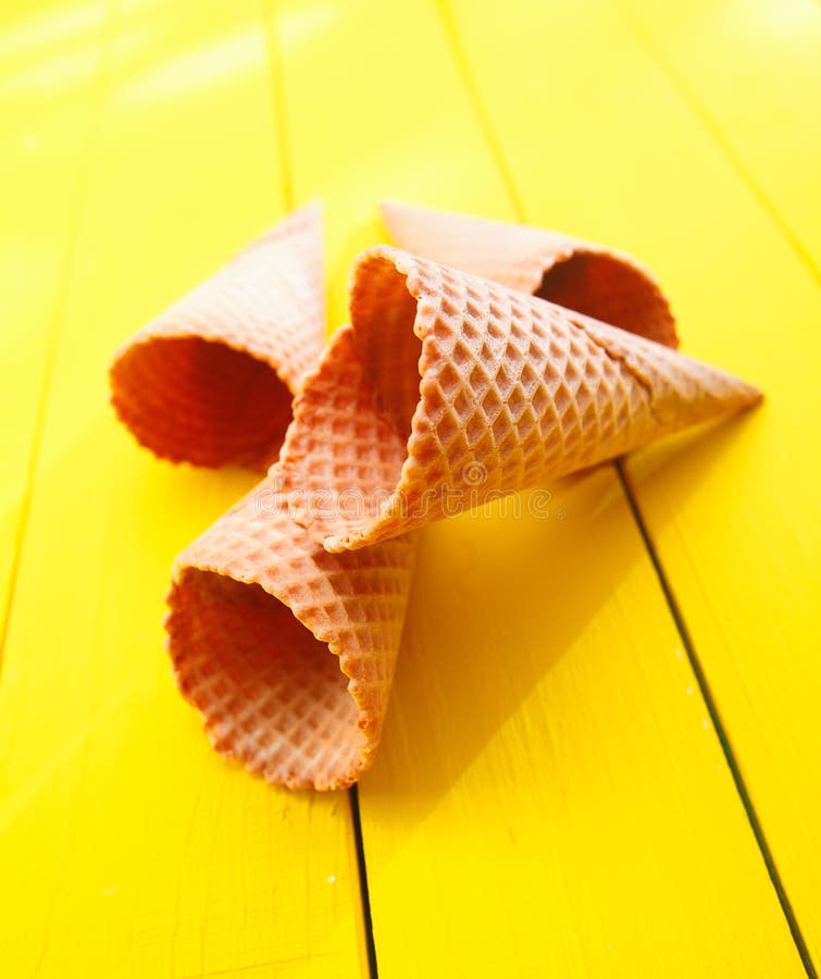 Ice Cream Cones on Yellow Table Stock Image - Image of dessert, cream ...