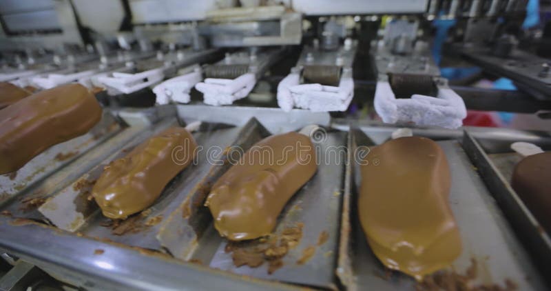 Ice Cream is Dipped in Chocolate. Ice Cream Factory Stock Video - Video ...