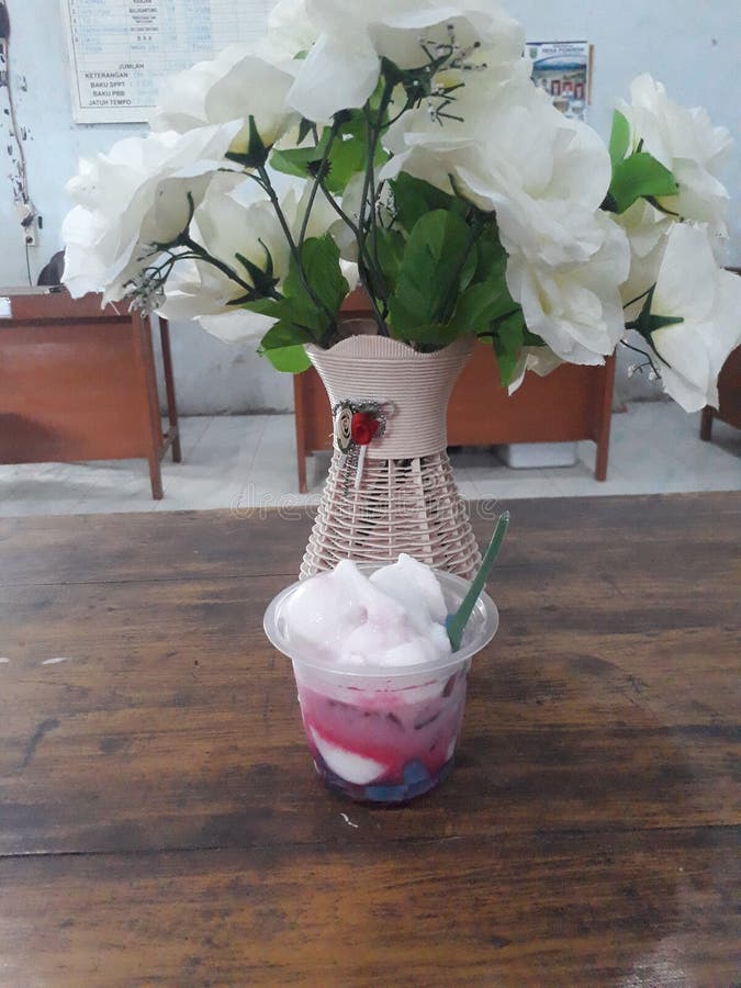 Ice Cream and Flower Fas on the Table Stock Photo - Image of flower ...