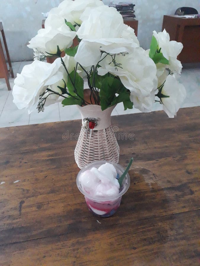 Ice Cream and Flower Fas on the Table Stock Photo - Image of flower ...