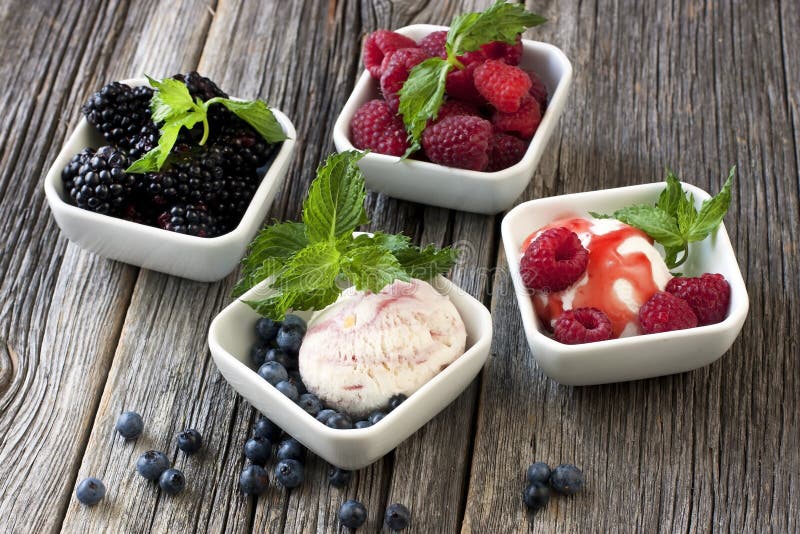 Ice Cream with Fresh Raspberries and Blueberries Stock Photo - Image of ...