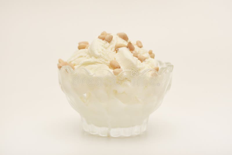 Ice Cream in a Glass Ice Cream Maker with Pine Nuts. Ice Cream with ...