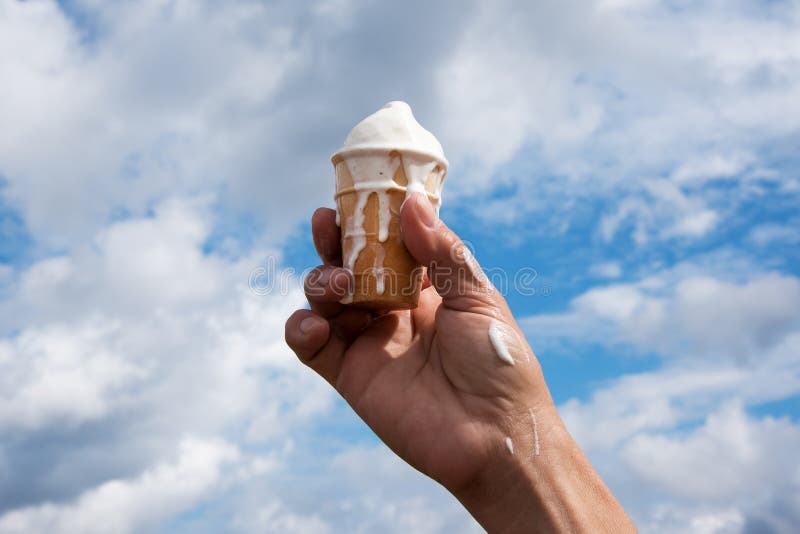 Ice cream in hand. stock photo. Image of dripping, melt - 62626988
