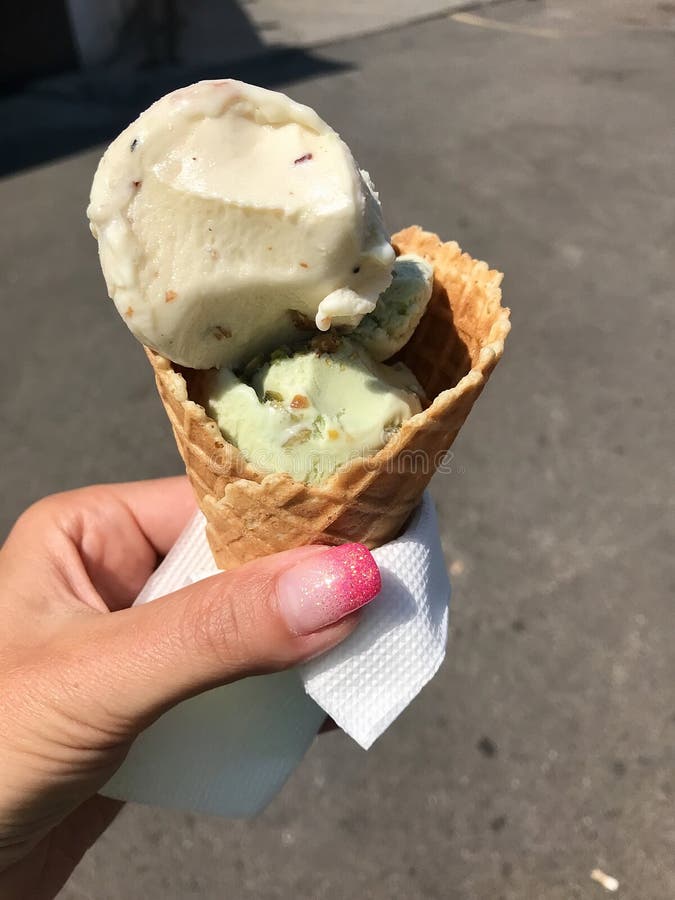 Ice cream in hand stock image. Image of icecream, eating - 96816617