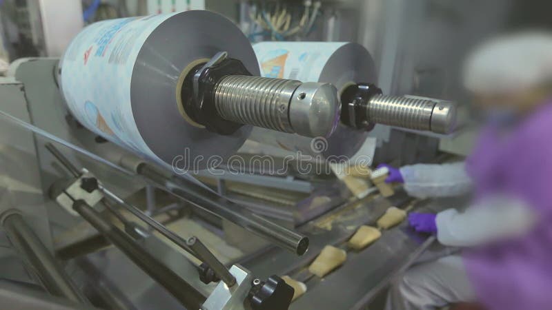 Ice Cream Making Process. Modern Ice Cream Factory. Automatic Packaging ...