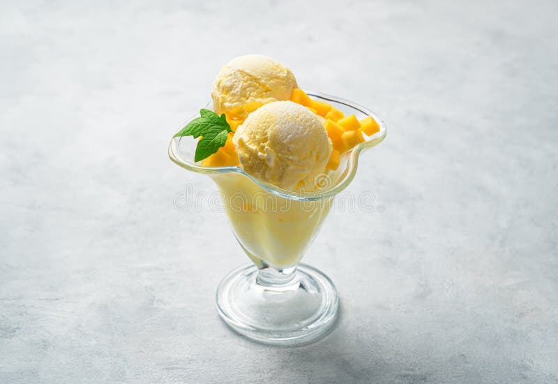 Ice Cream with Mango and Mint on a Gray Background. Stock Photo - Image ...