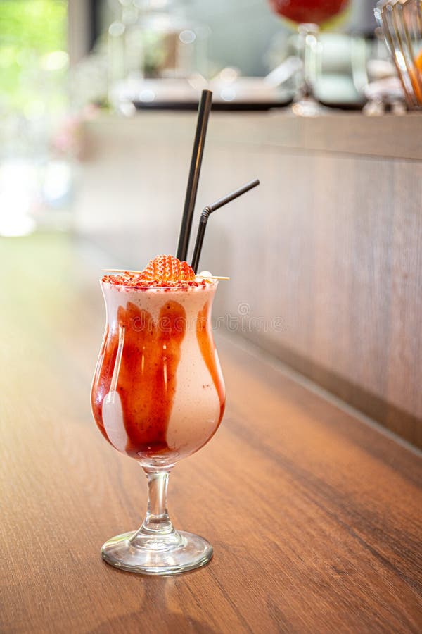 Ice Cream Milk Shake with Caramel and Two Straws Stock Photo - Image of ...