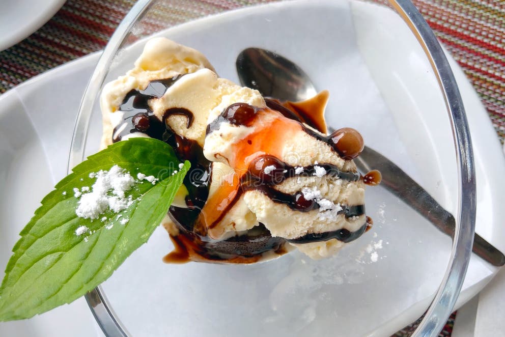 Ice Cream with a Mint Leaf and Jam with Chocolate. Stock Image - Image of food, cream: 264492293