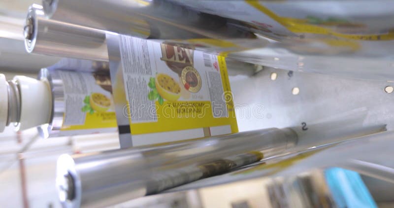 Ice Cream Packaging in Cellophane. Ice Cream Packaging Process Stock ...