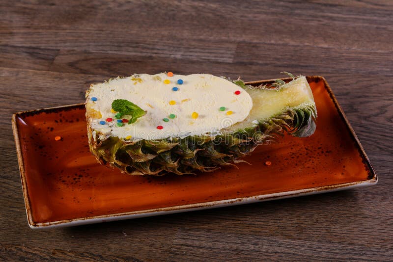 Ice-cream in the pineapple stock photo. Image of pineapple - 113439956