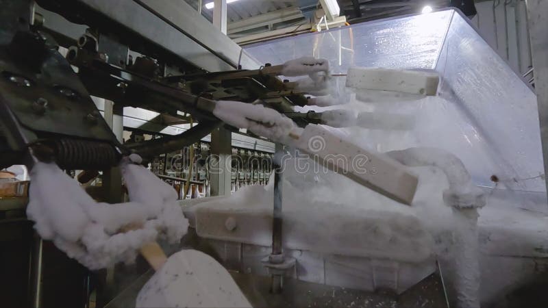 Ice Cream Production Process. Freezing Ice Cream on the Conveyor Slow ...
