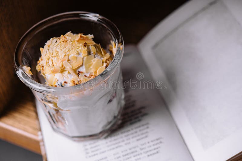 Ice Cream Scoop with Almonds and Book Stock Image - Image of cappuccino ...