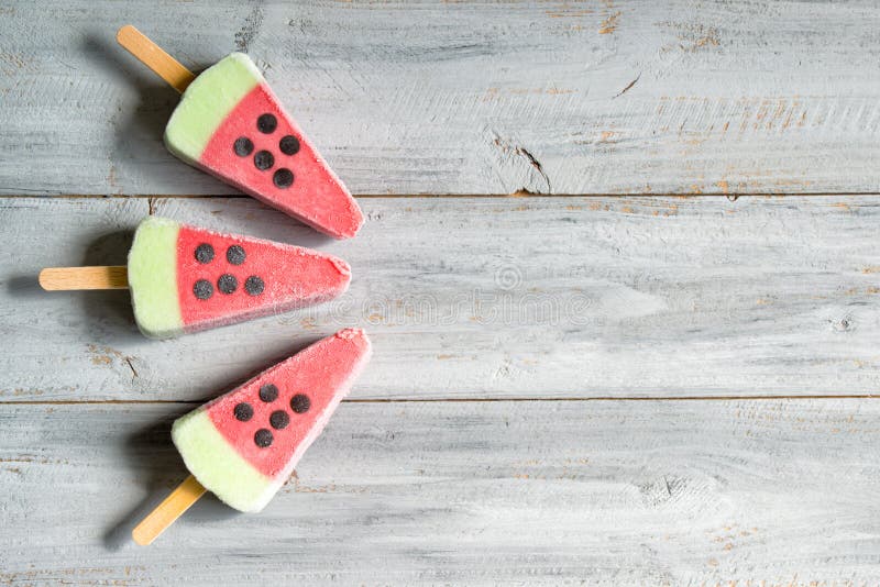 Ice Cream in a Shape of Watermelon Slices on Wooden Table, Top View ...