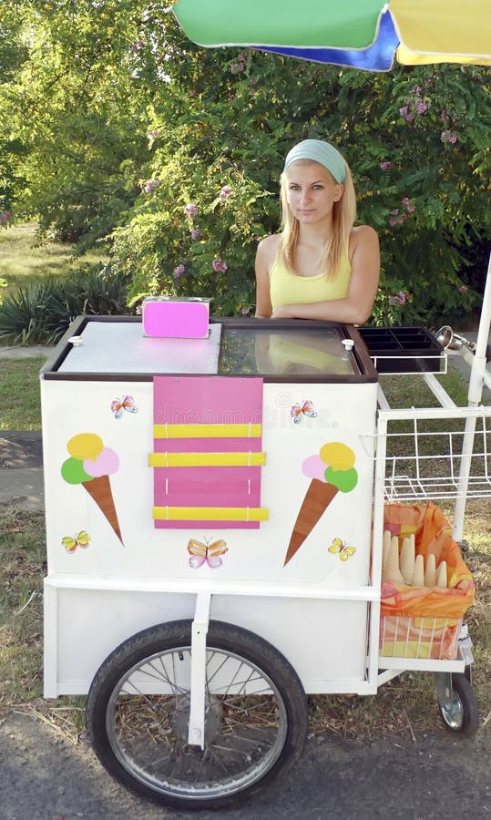 Ice cream vendor girl stock image. Image of wheel, vertical - 12806663