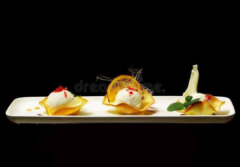 Ice cream in wafer cups stock image. Image of molecular - 83765827