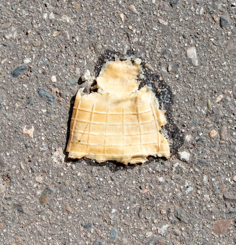 An Ice Cream Waffle Cup Lies on the Ground Stock Photo - Image of ...