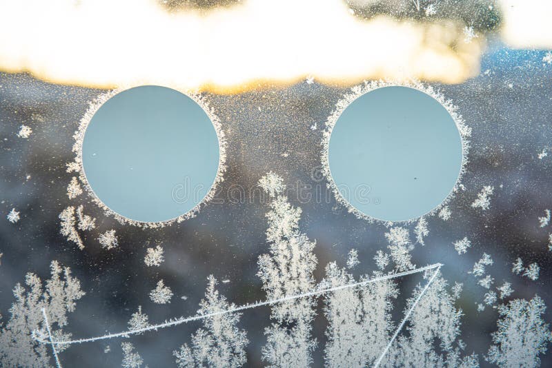 Ice Crystals Forming on a Glass Wall with Round Decals.. Stock Photo ...