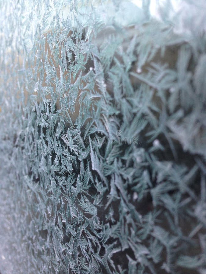Ice crystals on glass stock photo. Image of crystals - 79220996