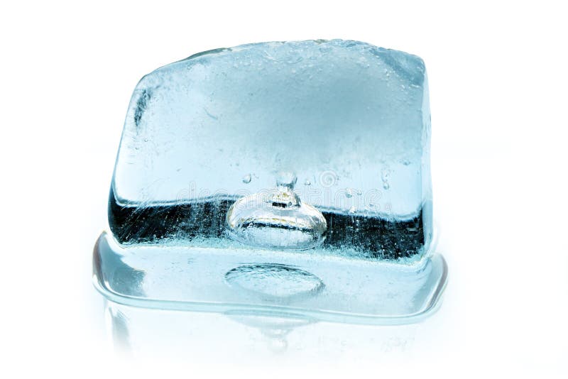 Ice cube and chili peppers stock photo. Image of glass - 28050622