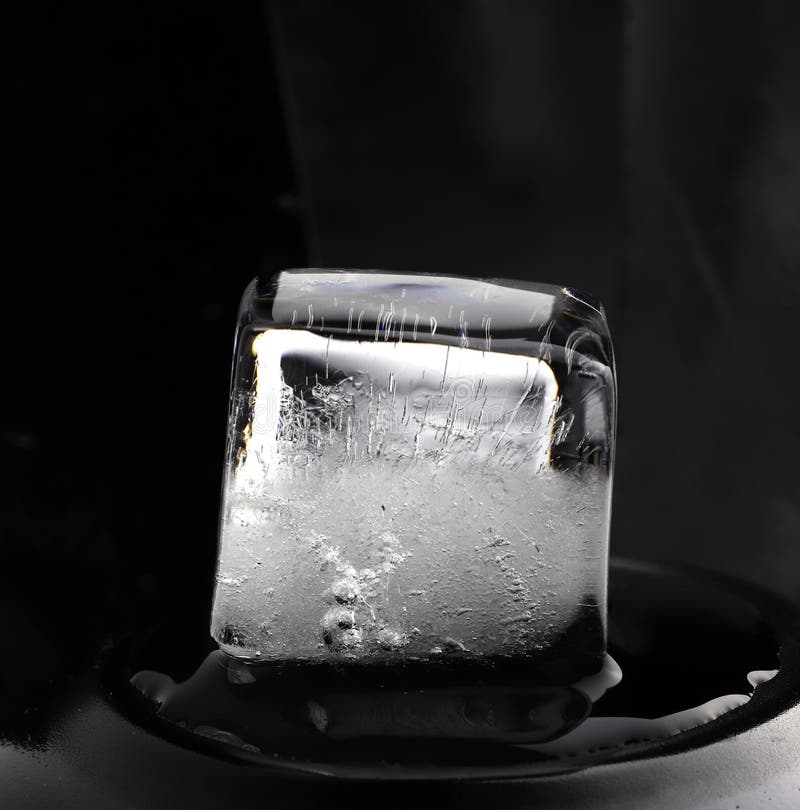 Ice Cube on Black Background. Low Key Photo Stock Photo - Image of ...