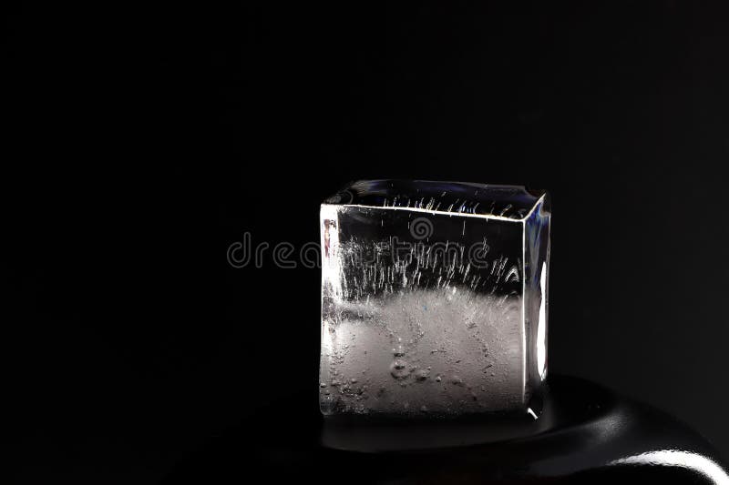 Ice Cube on Black Background. Low Key Photo Stock Image - Image of ...