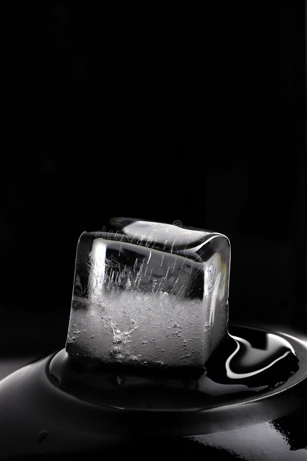 Ice Cube on Black Background. Low Key Photo Stock Photo - Image of ...