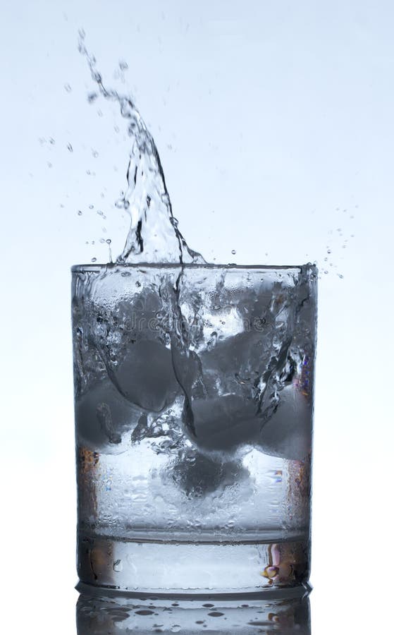 Ice Cube Drop into Water Glass Stock Photo - Image of refreshment, cube ...