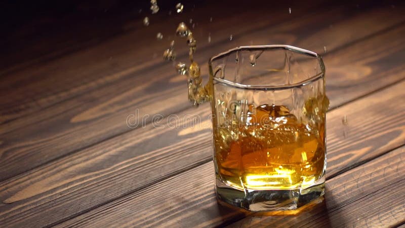 Ice Cube Falling Alcohol Drink Close Up. White Wine Splashing Out Clear ...