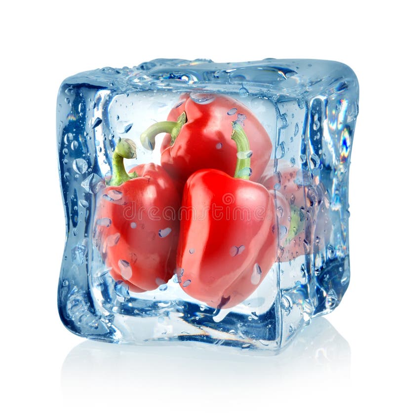 Ice cube and chili peppers stock photo. Image of glass - 28050622
