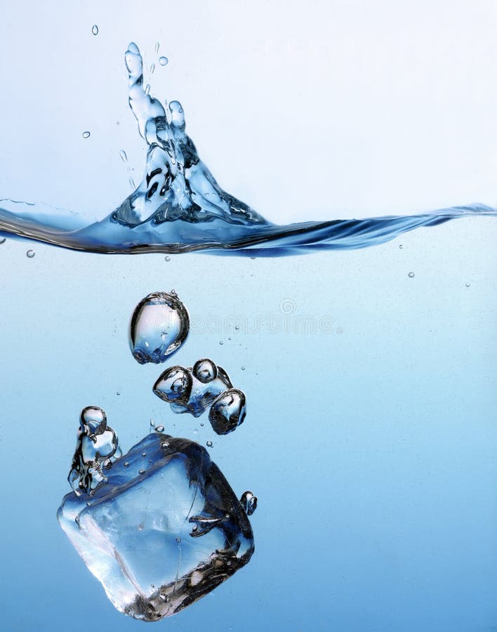 Two ice cube dropping stock photo. Image of drop, underwater - 9661640