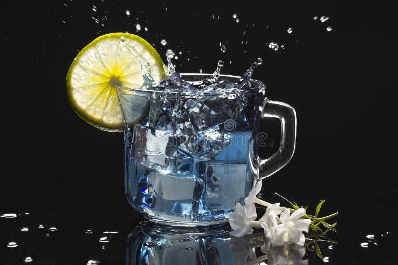 Making a Splash into a Refreshing Cold Drink. Stock Image - Image of ...