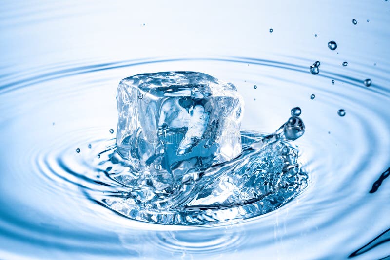 Ice Cube with Water Drops on a Blue Background. the Ice is Melting ...