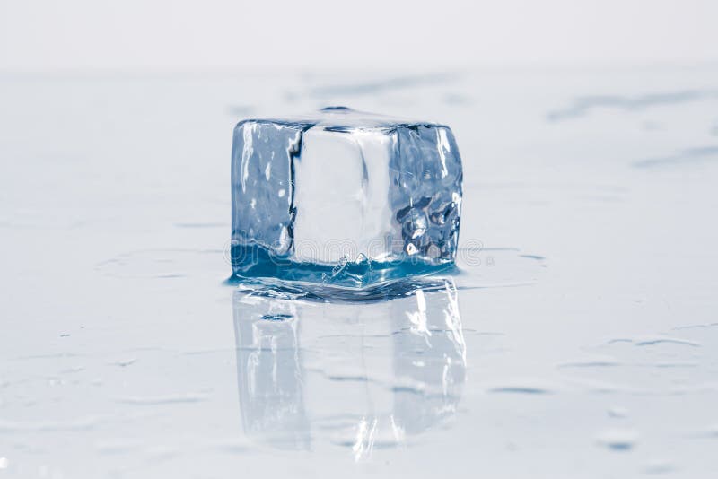 Ice cube on table stock photo. Image of background, macro - 75139352