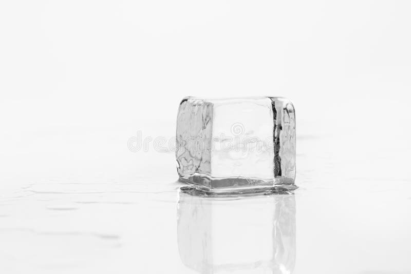 Ice cube on table stock image. Image of frozen, reflection - 75293145