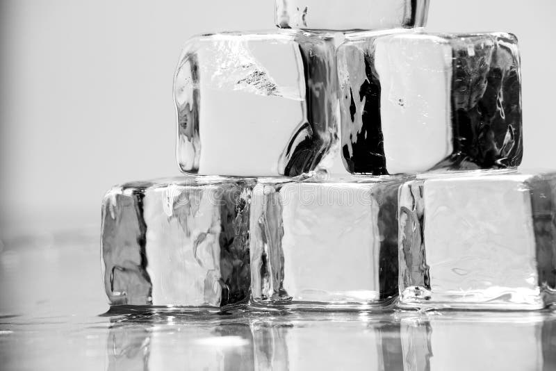 Ice cube on table stock photo. Image of melting, liquid - 75293392