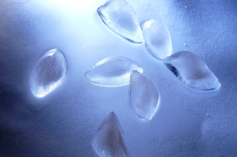 Ice cubes on blue stock image. Image of bluish, freezing - 3129877