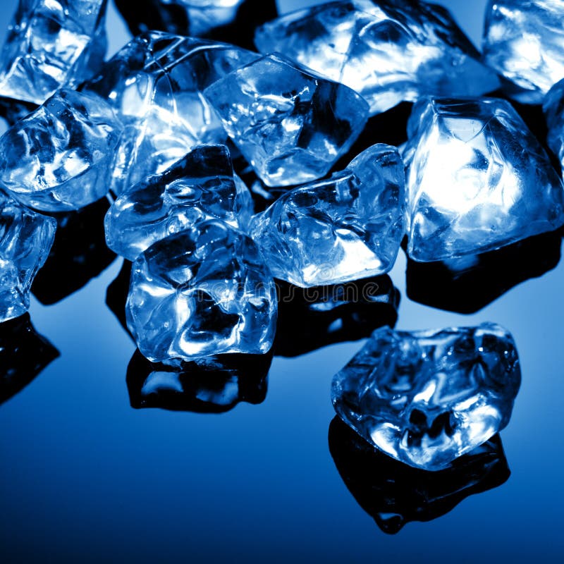 Ice cubes in blue light stock image. Image of background - 7470963