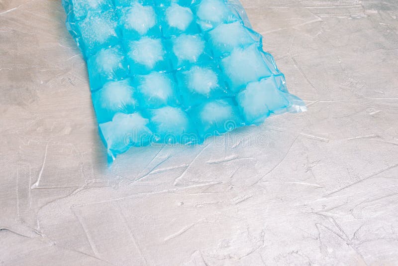 Ice Cubes in a Blue Plastic Bag. Disposable Ice Molds Stock Image ...
