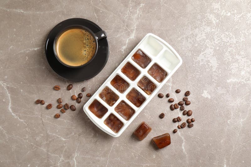 Ice Cubes, Cup of Coffee and Beans on Grey Table, Flat Lay Stock Image ...