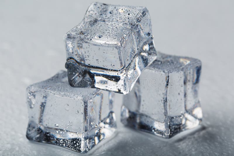 Ice Cubes in the Form of a Pyramid with Water Drops Close - Up in Macro ...