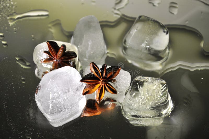 Ice Cubes on a Glass Surface and Aniseed Stars. Stock Image - Image of ...