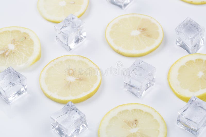 Ice cubes and lemon slices stock photo. Image of closeup - 98551768