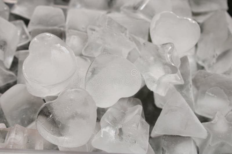Ice cubes in many shapes. stock image. Image of hearts - 297583465