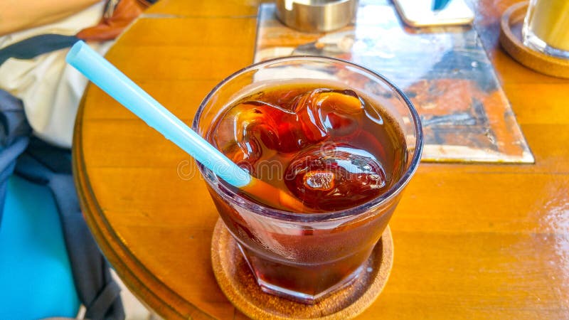 Cold Coffee with Ice Cubes and Pipette in a Coffee Shop Stock Image ...