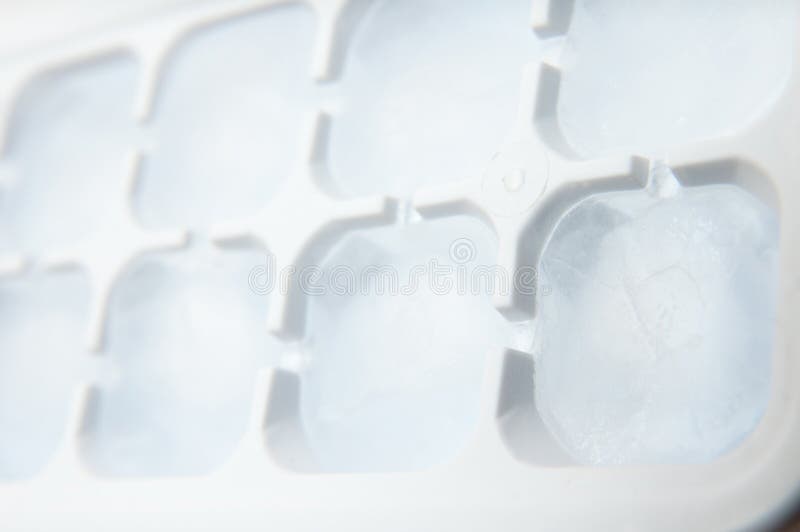 Ice cubes plastic form stock photo. Image of temperature - 68190908