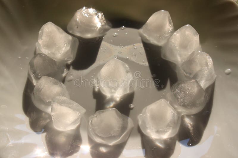 Ice cubes on the plate stock photo. Image of frozen, cool - 56490602