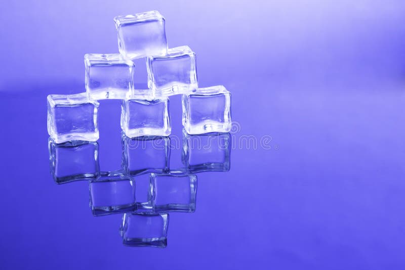 Ice Cubes Put on Each Other on Blue Background Stock Image - Image of ...